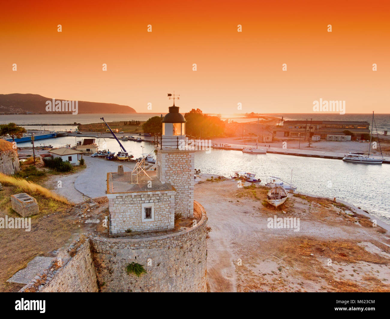 Sunset at the lighthouse in Lefkada Town in Lefkada (Lefkas) Island ...