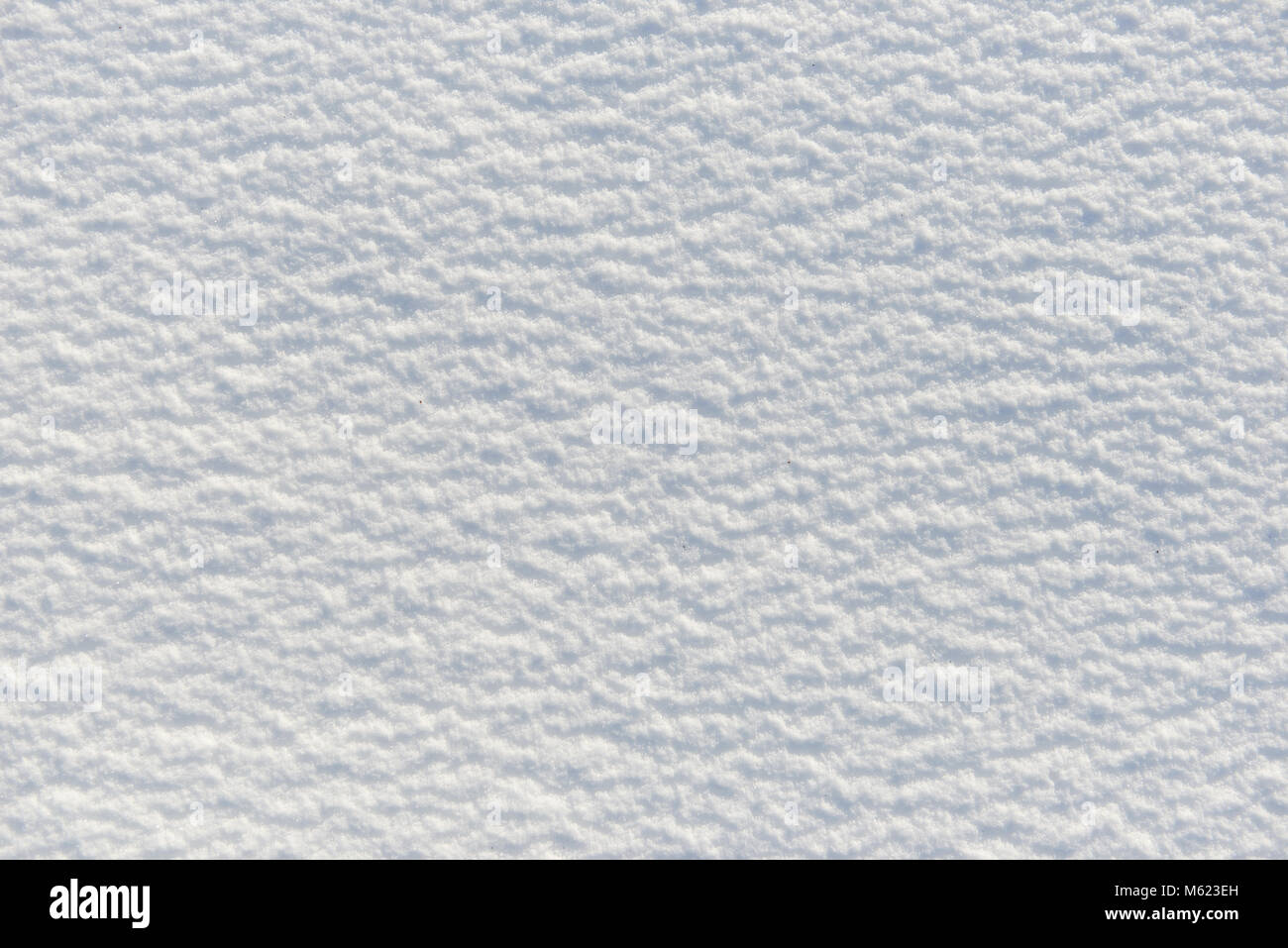 snow for texture or background at sunny day, bright light with shadows ...