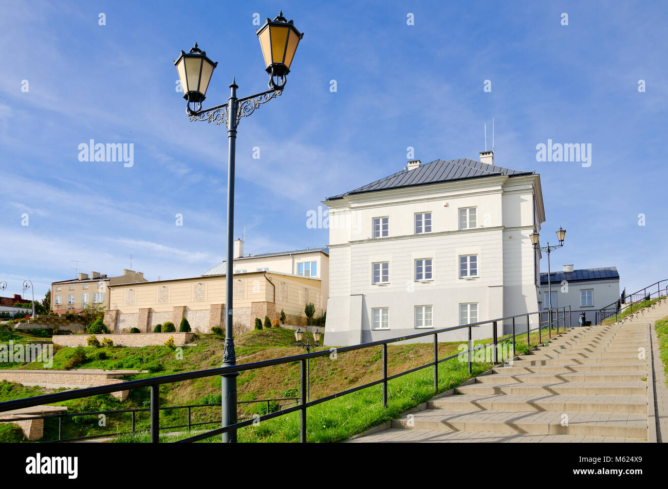 Classicist town hall in Warka, view from riverside of Pilica. Masovian ...
