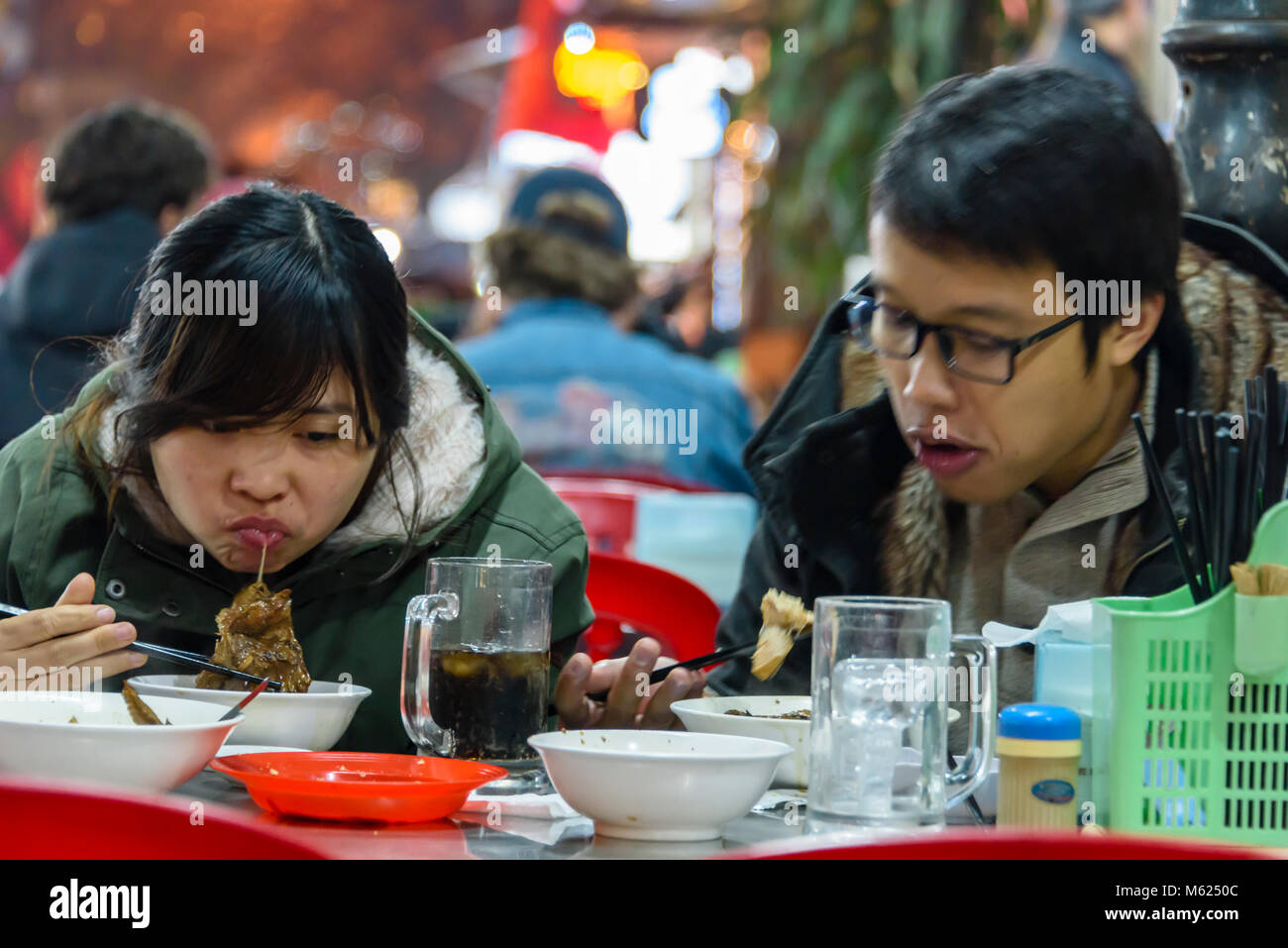 Family vietnam vietnamese eating hi-res stock photography and images ...