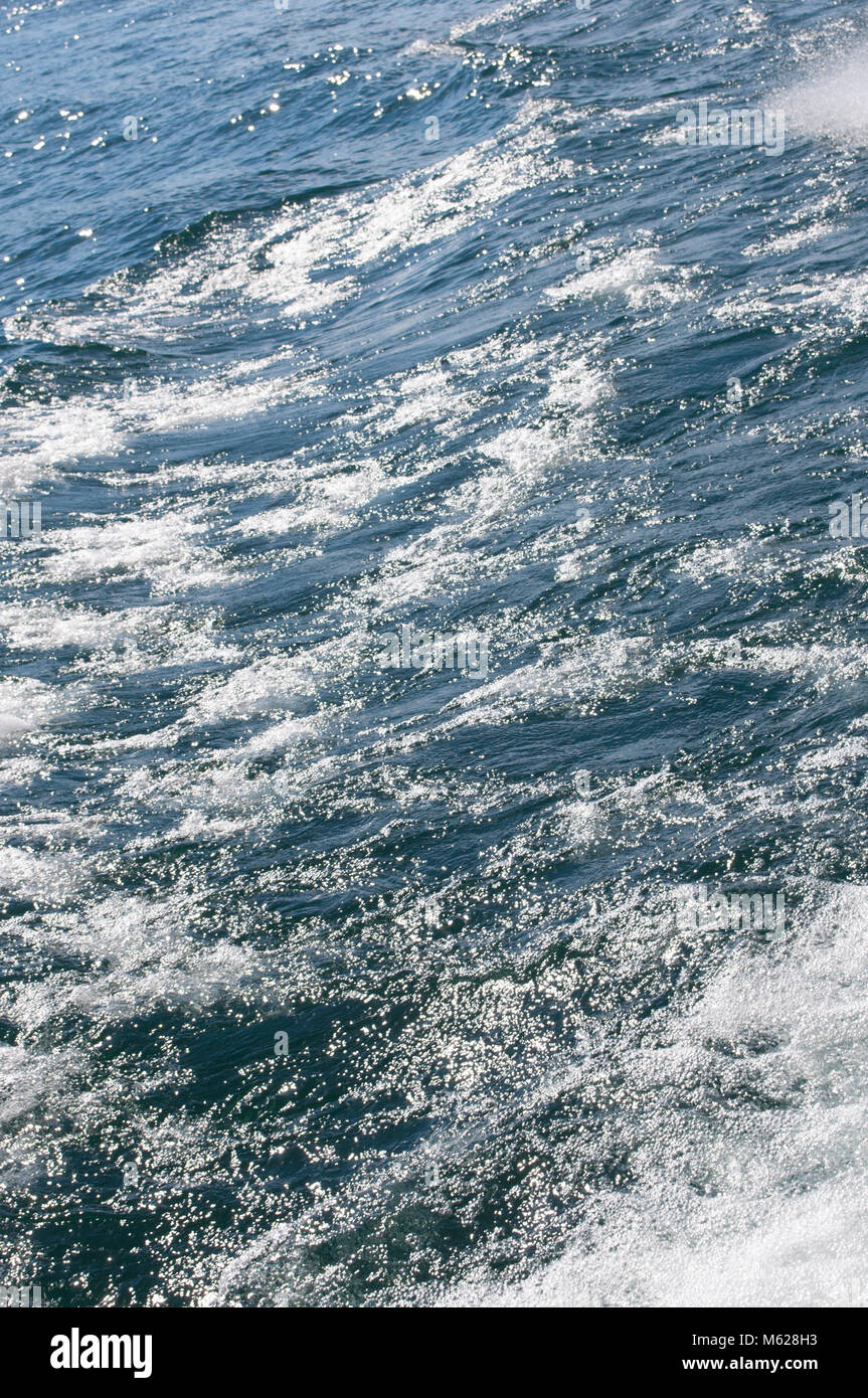 Surface waves created by a boat hi-res stock photography and images - Alamy