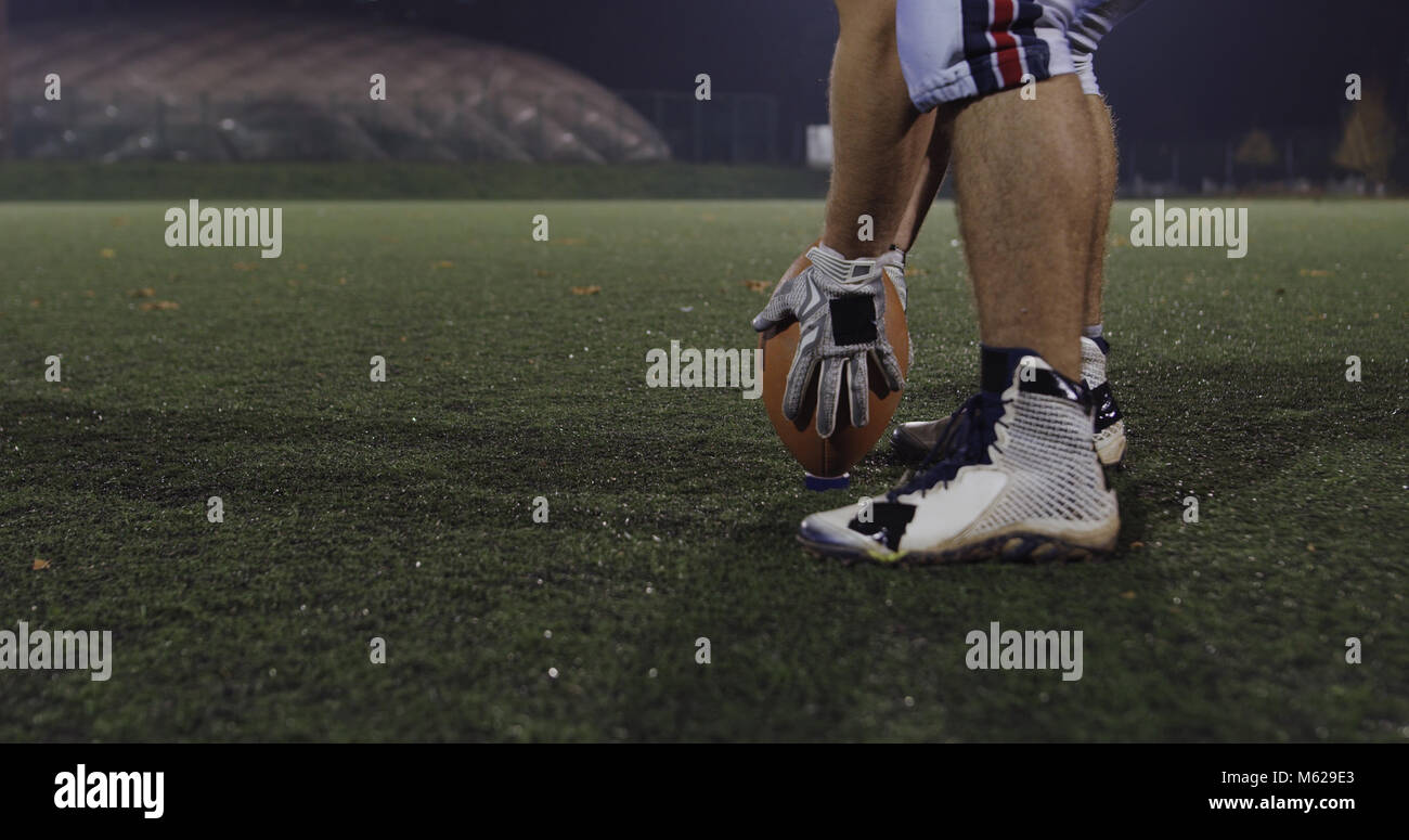 american football kicker ready for football kickoff closeup shot on the ...