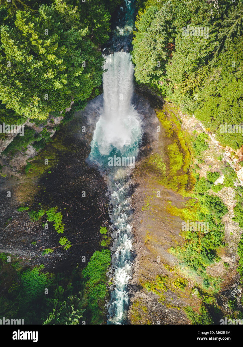 Overhead aerial angle on amazing Canadian waterfall in earth crater ...