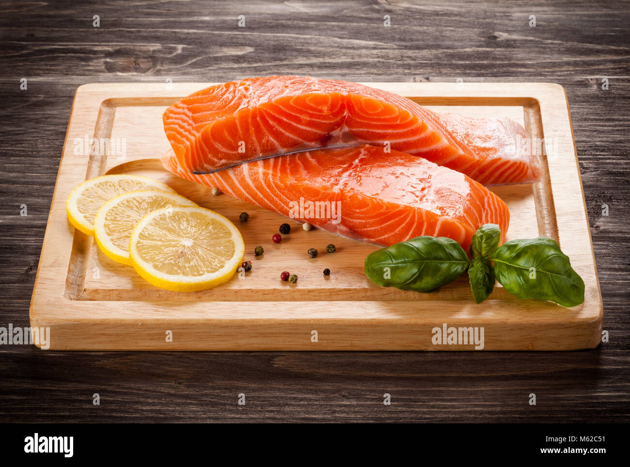 Fresh salmon filet wooden hi-res stock photography and images - Alamy