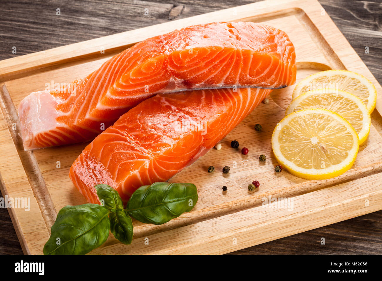 Fresh salmon filet wooden hi-res stock photography and images - Alamy