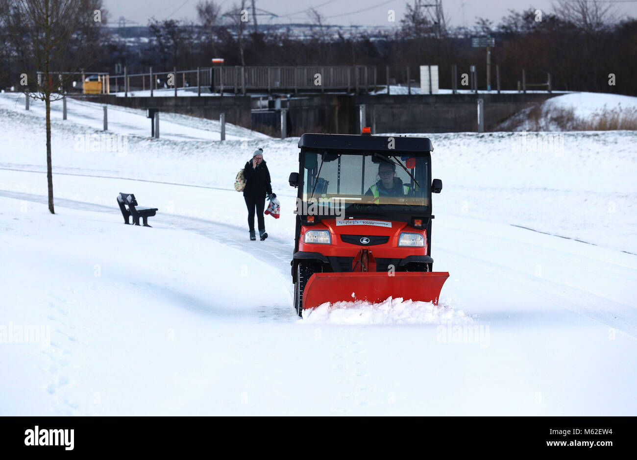 A small snow plough clears paths in Helix Park, Falkirk, as heavy snow ...