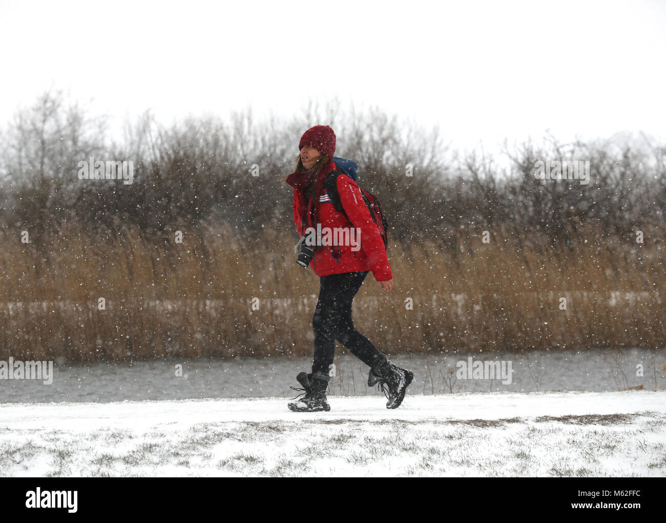 A person walks through Helix Park in Falkirk, as heavy snow has caused ...