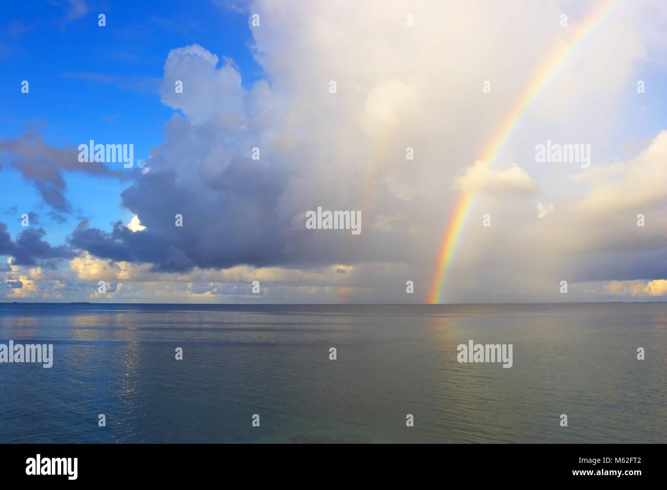 Nice seascape with rainbow in the Indian Ocean Stock Photo - Alamy