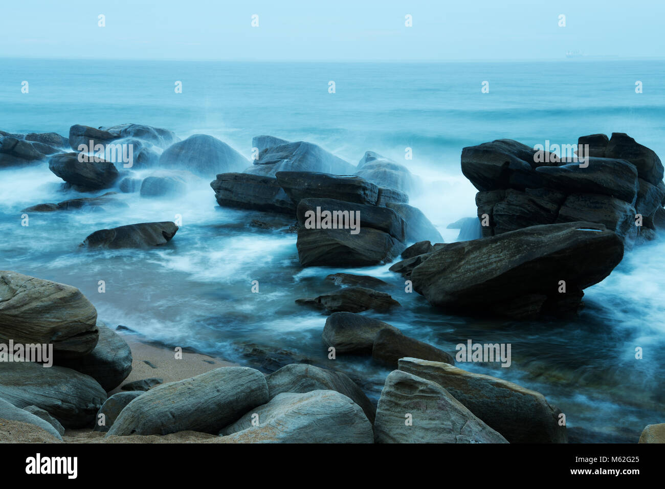 Durban, KwaZulu-Natal, South Africa, blur, close-up seawater flowing ...