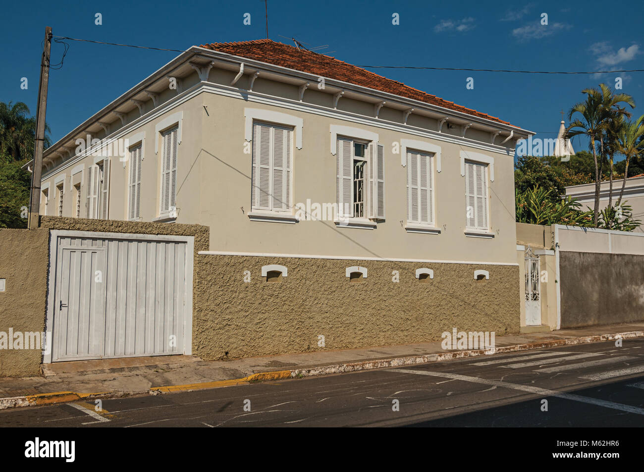 São Manuel, southeast Brazil. Working-class house with garage door in ...