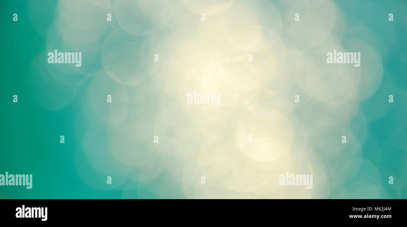 Soft focus bokeh light effects over a rippled, blue water background in the pool Stock Photo - Alamy