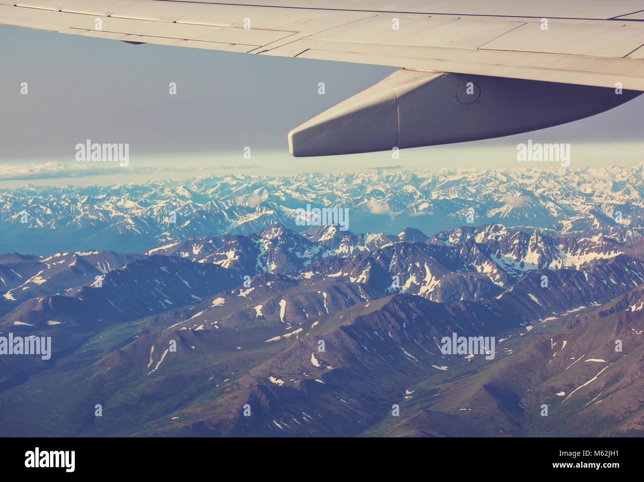 Aerial view from aircraft flying in high altitude. Landscape from above ...