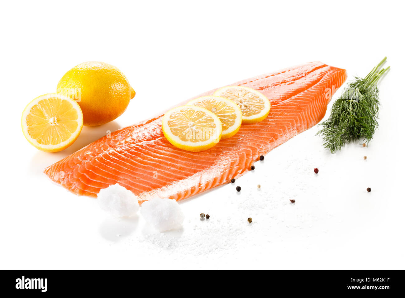 Salmon fillets on white Cut Out Stock Images & Pictures - Alamy