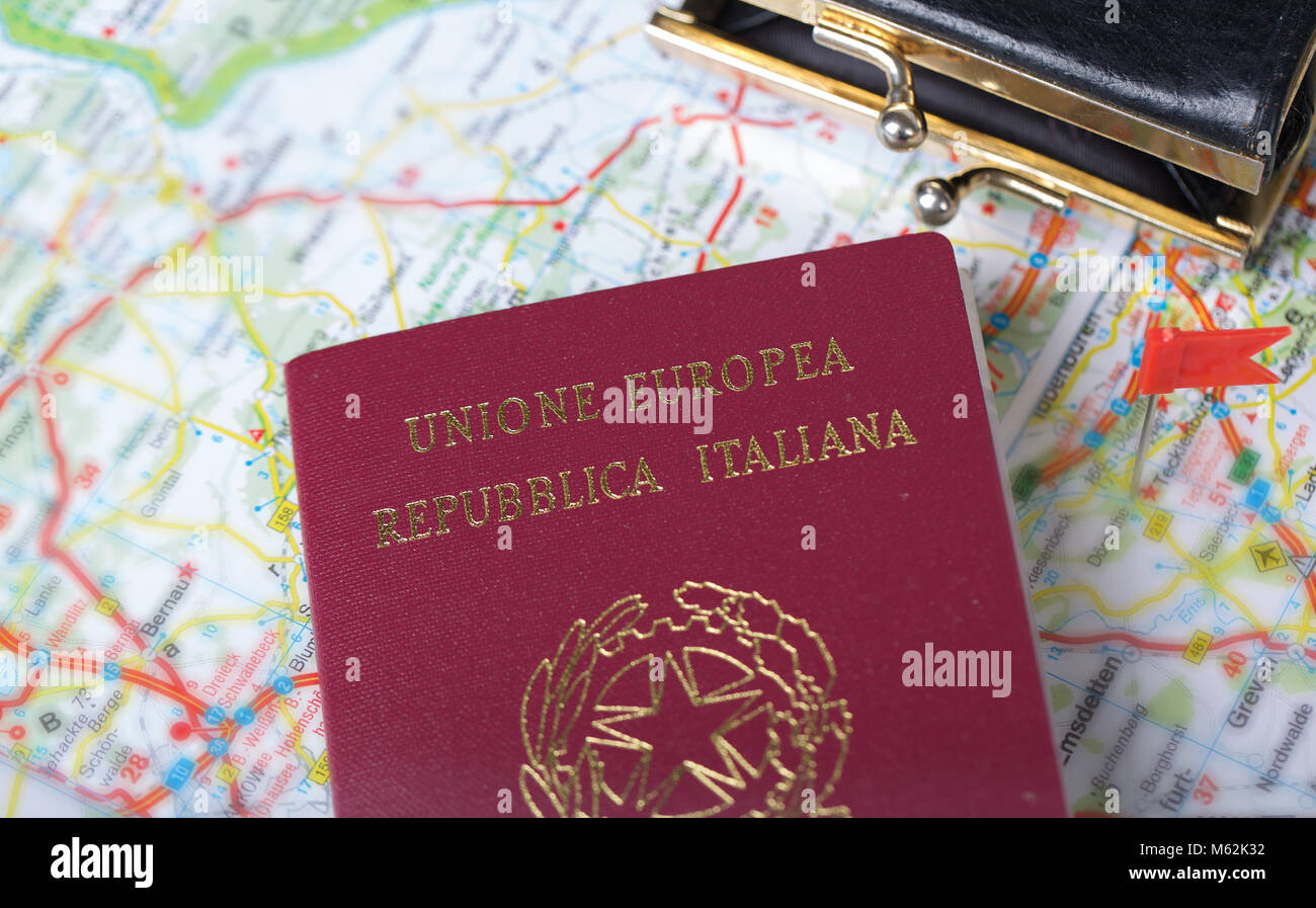 Italian passport on a map. Closeup Stock Photo - Alamy