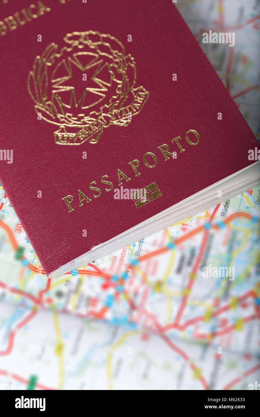 Italian passport on a map. Closeup Stock Photo - Alamy