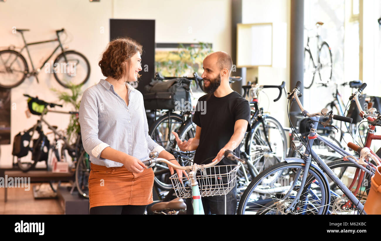 Bicycle shop consulting - salesman and customer in conversation Stock ...