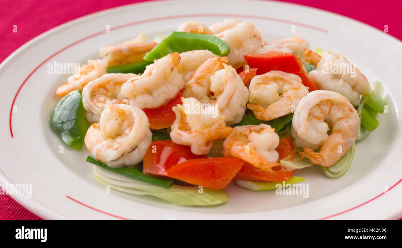 King prawns plate with onion, green and red bell peppers. Chinese ...