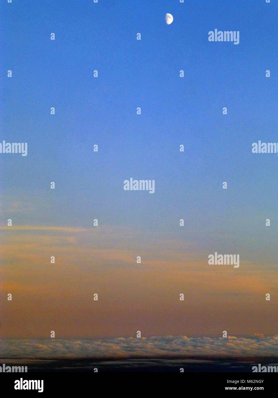 Aerial view of sunset sky with half moon Stock Photo - Alamy