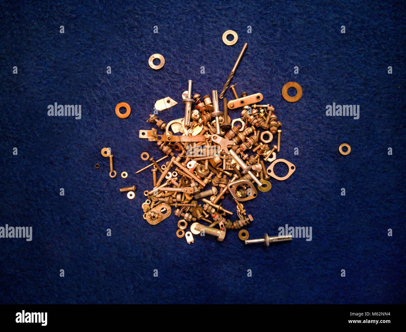 On a blue background with an original illumination there is a heap of ...