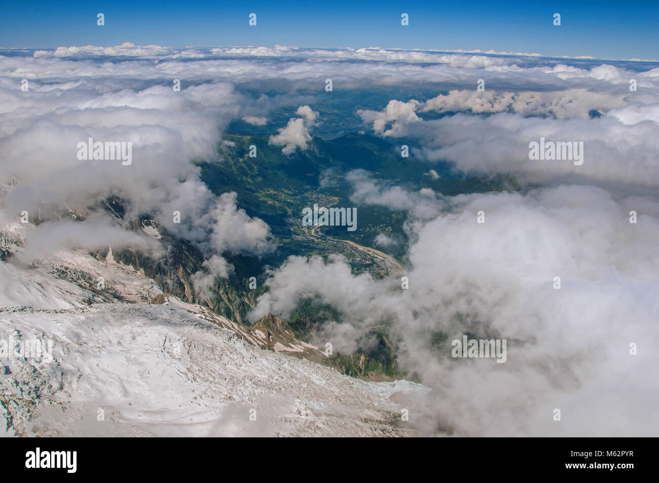 Snow, glacier and Chamonix Valley, viewed from the Aiguille du Midi ...
