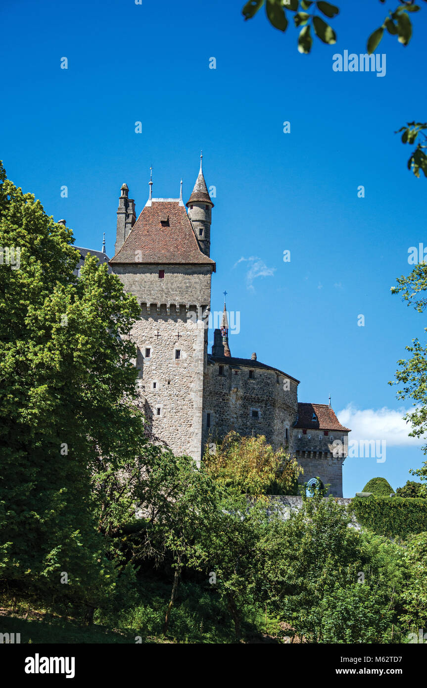 Castle of Menthon-Saint-Bernard with trees and blue sky, near the Lake ...