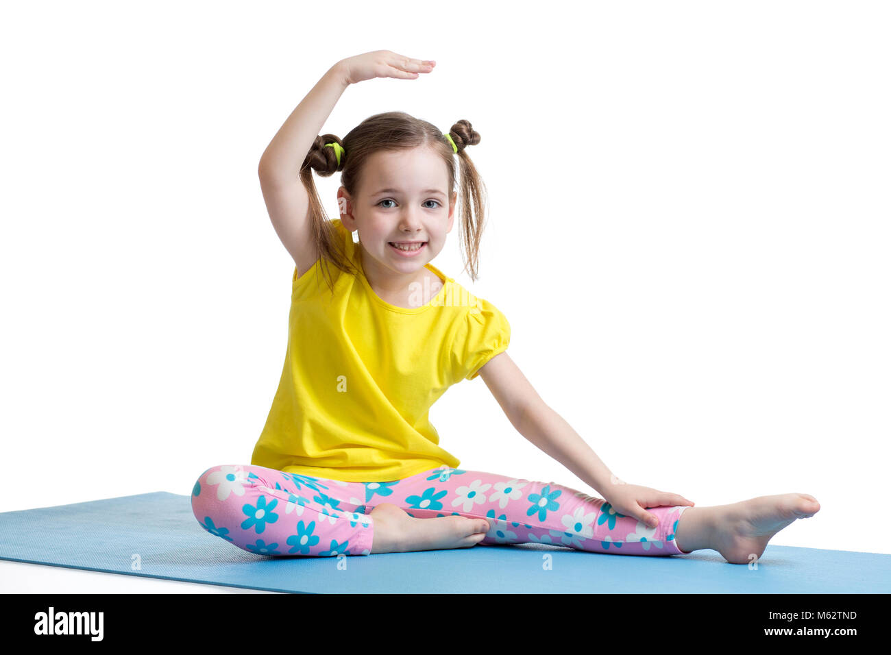 Child girl doing fitness exercises Stock Photo - Alamy