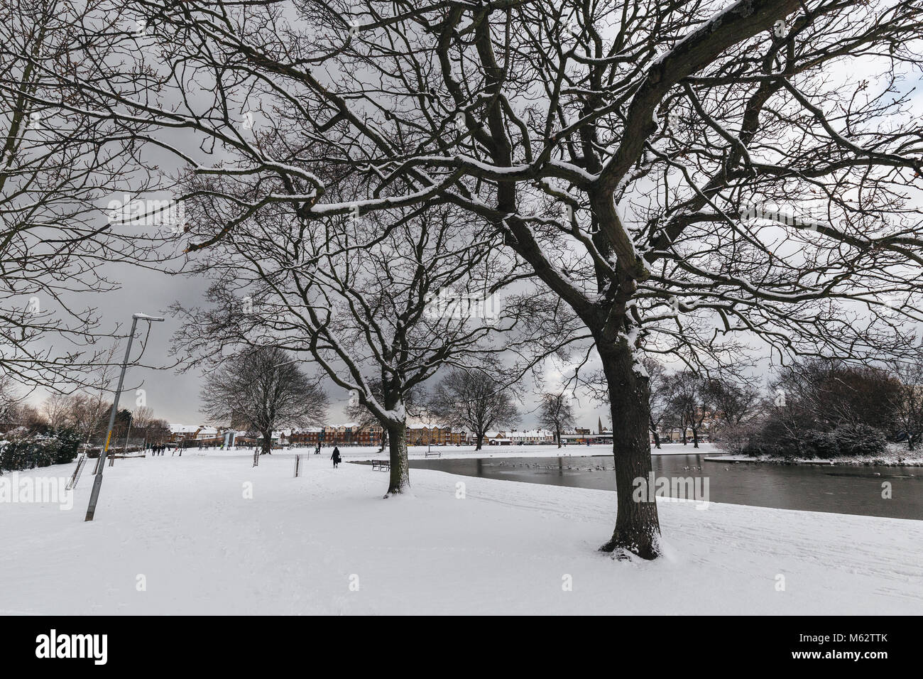 Winter snow in town park in Herne Bay Kent England Stock Photo - Alamy