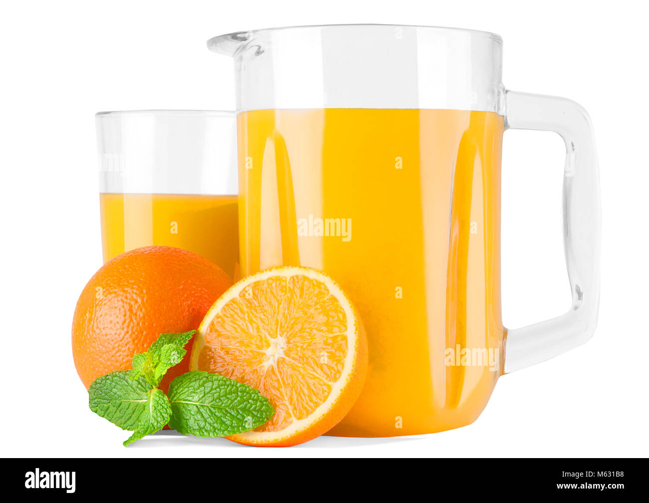 Glass pitcher with orange juice and fresh orange Stock Photo - Alamy