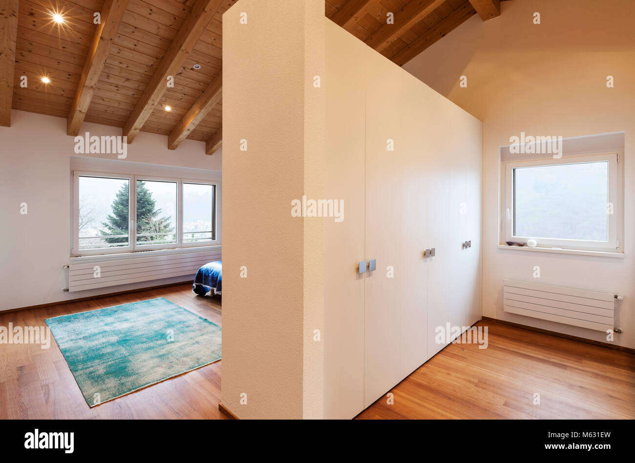 Beautiful modern loft, bedroom view from passage Stock Photo - Alamy