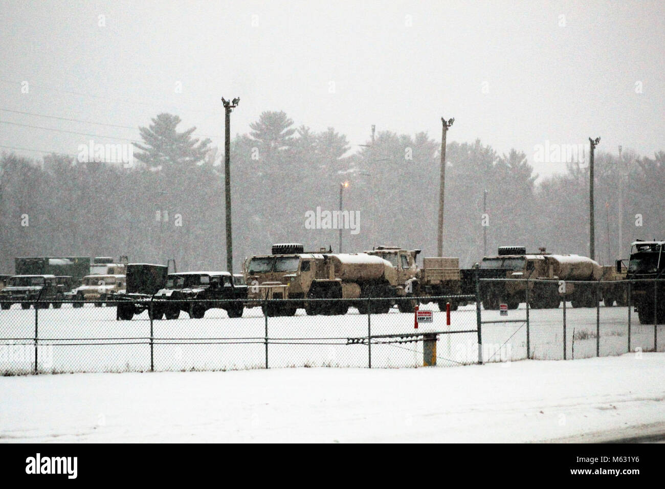 Soldiers at the installation for training move equipment in a staging ...
