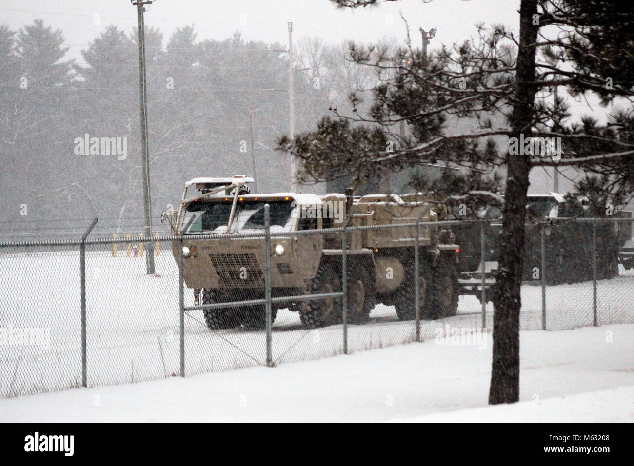 Soldiers at the installation for training move equipment in a staging ...