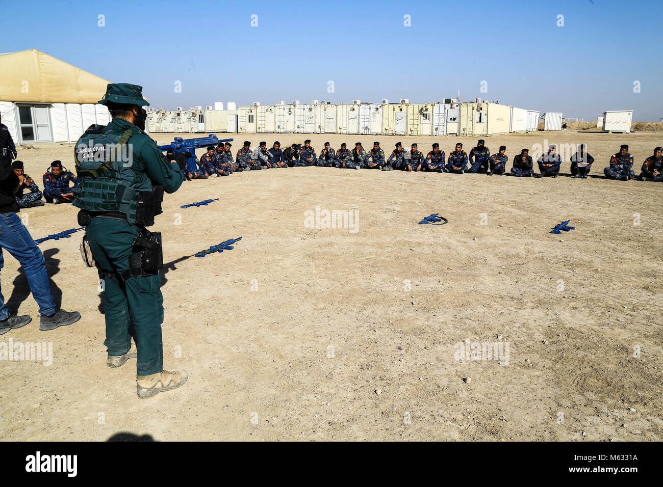 Iraqi Federal Police attached to the 1st Battalion, conduct a class on ...