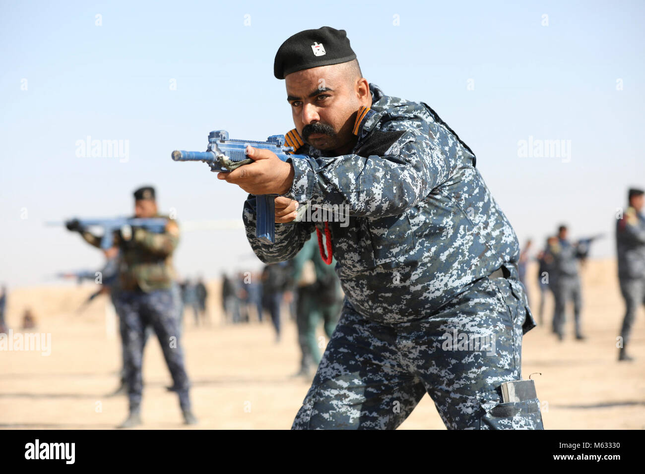 An Iraqi Federal Police member assigned to 3rd Battalion, 4th Brigade ...