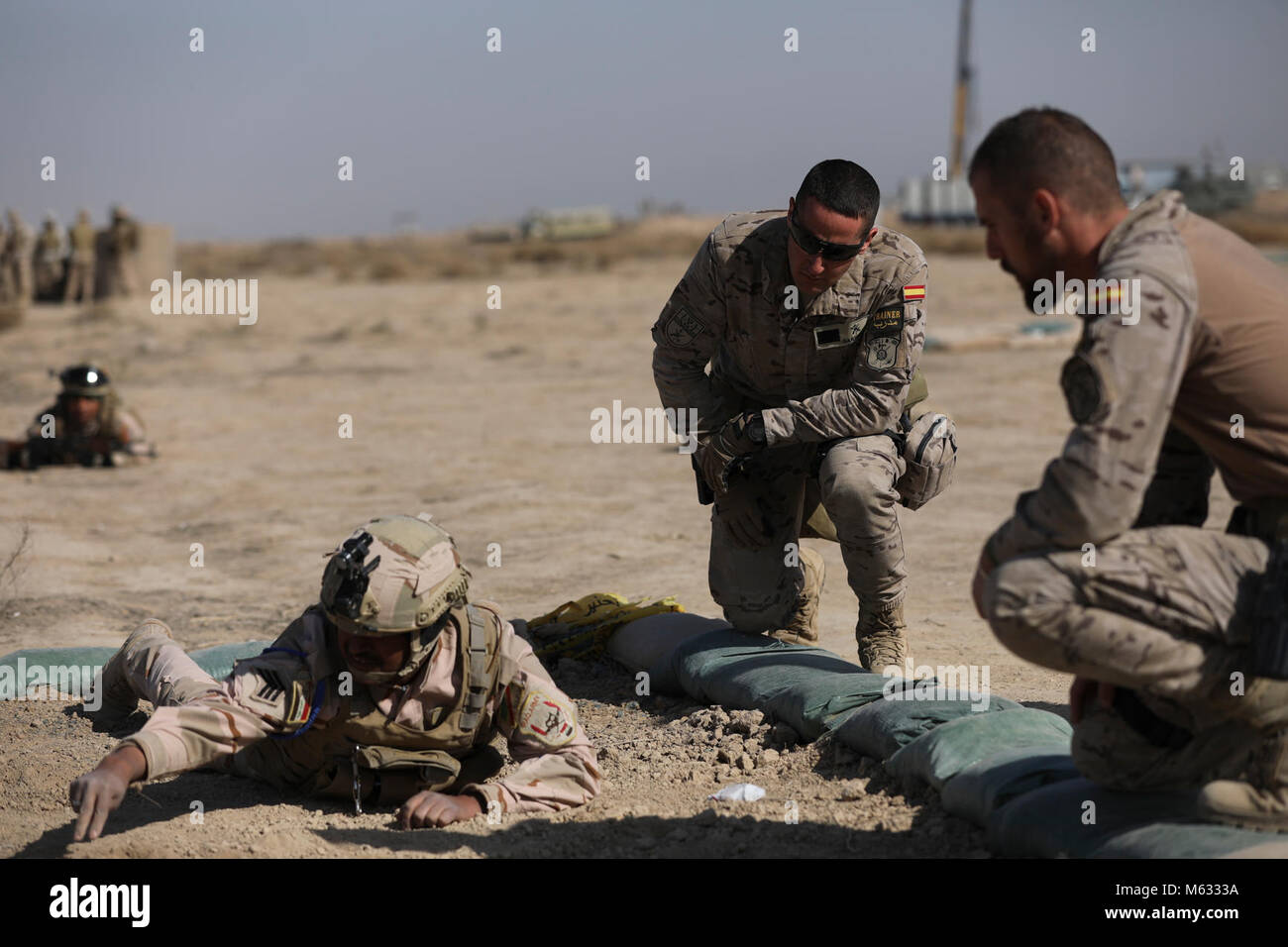 An Iraqi army member assigned to 1st Battalion, 40th Brigade, takes ...