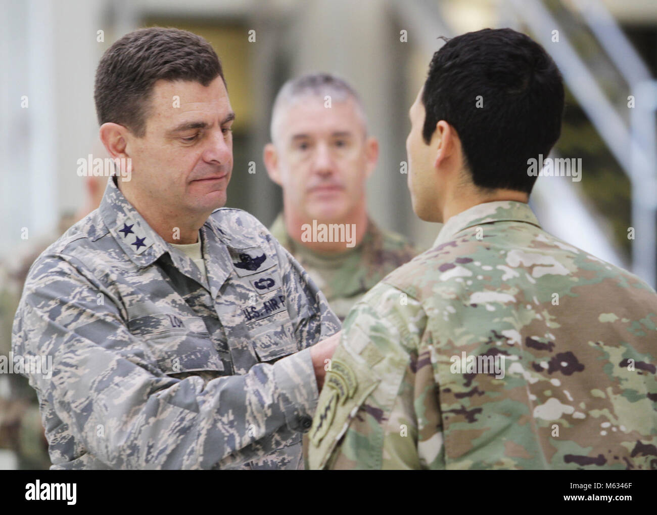 The Adjutant General of Colorado U.S. Air Force Maj. Gen. Mike Loh pins ...