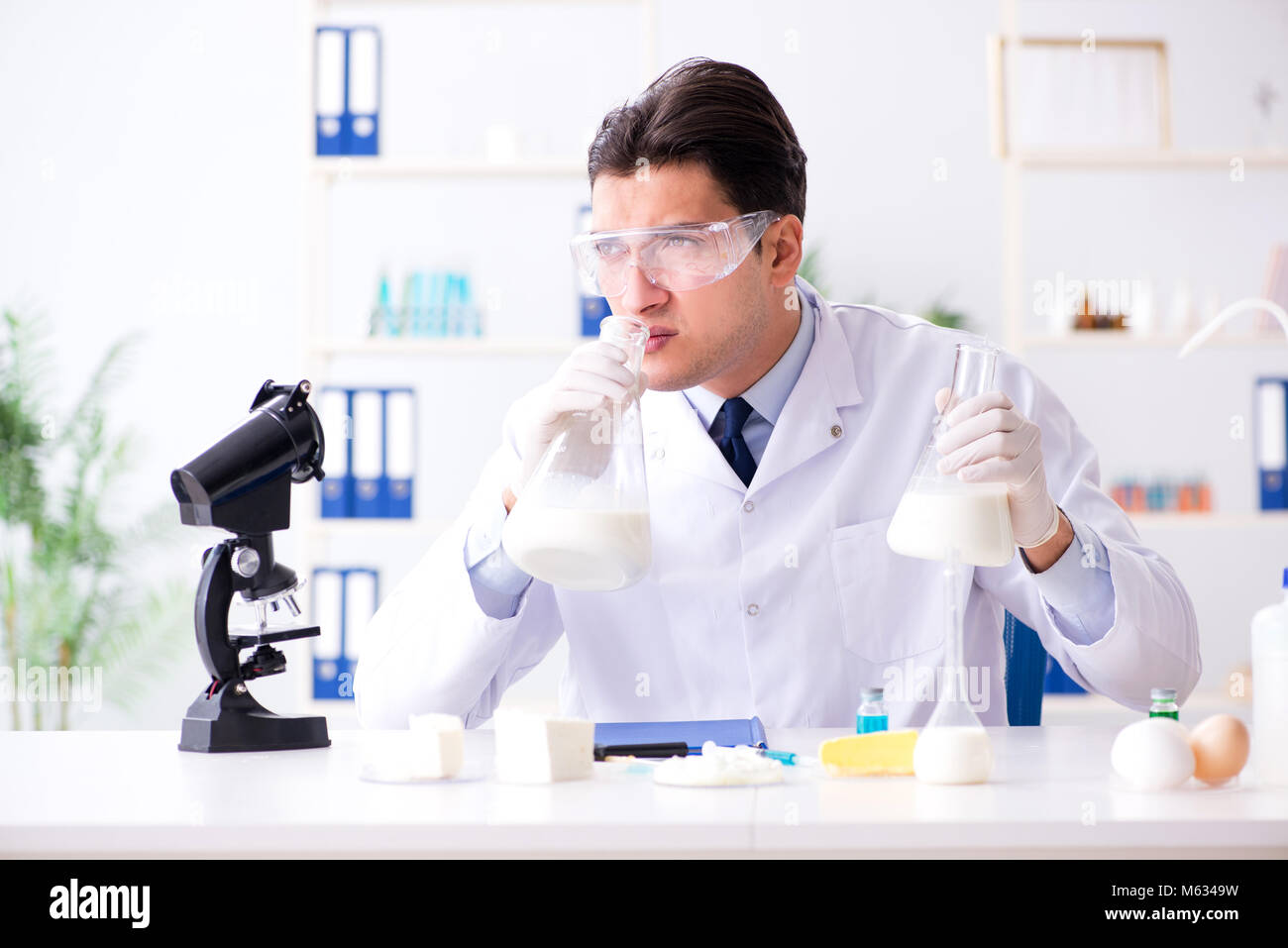 Food scientist testing new stuff in the lab Stock Photo - Alamy