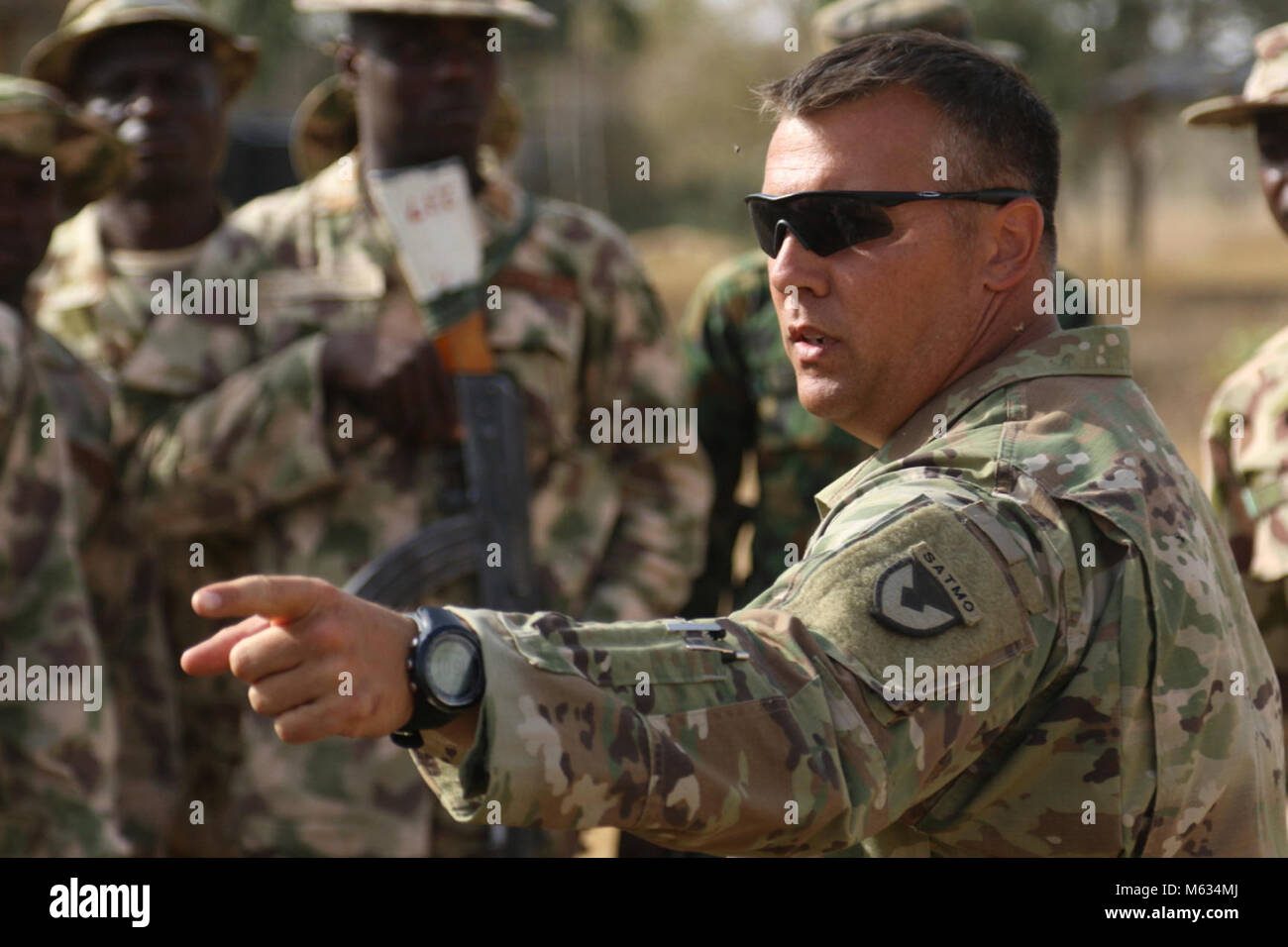 Twelve Soldiers U.S. Army Soldiers share tactics and training with a ...