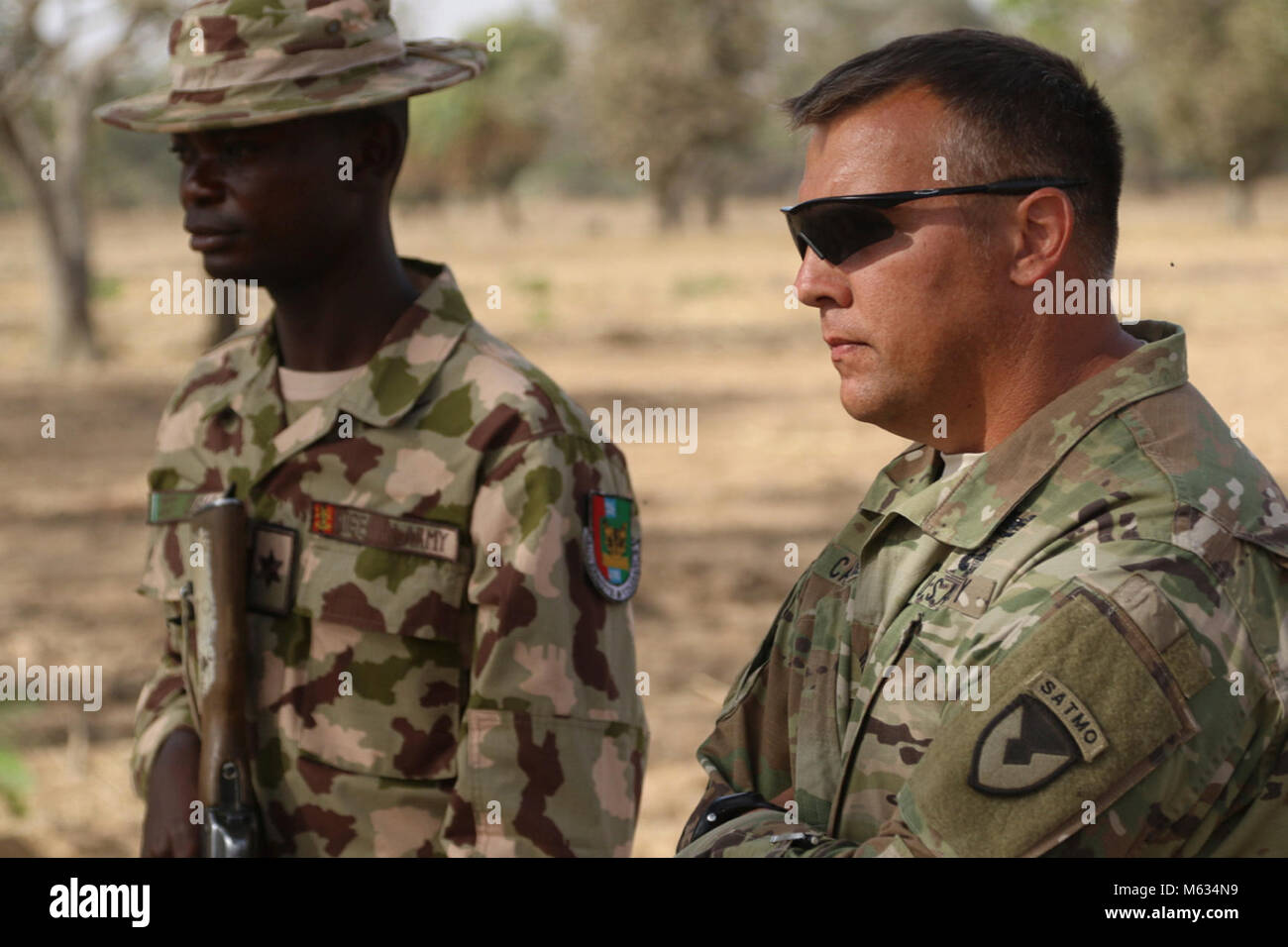 Twelve Soldiers U.S. Army Soldiers share tactics and training with a ...