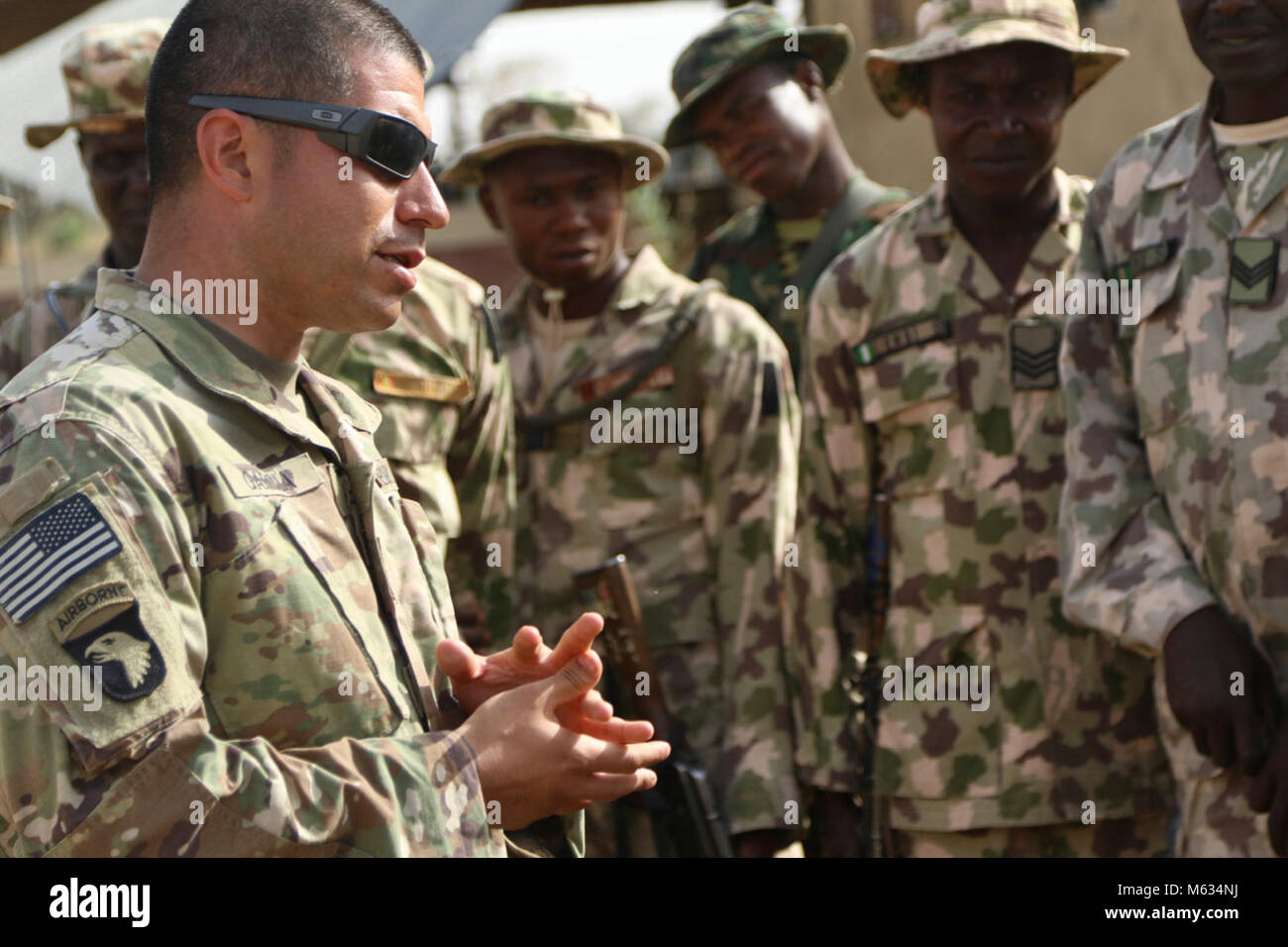 Twelve Soldiers U.S. Army Soldiers share tactics and training with a ...