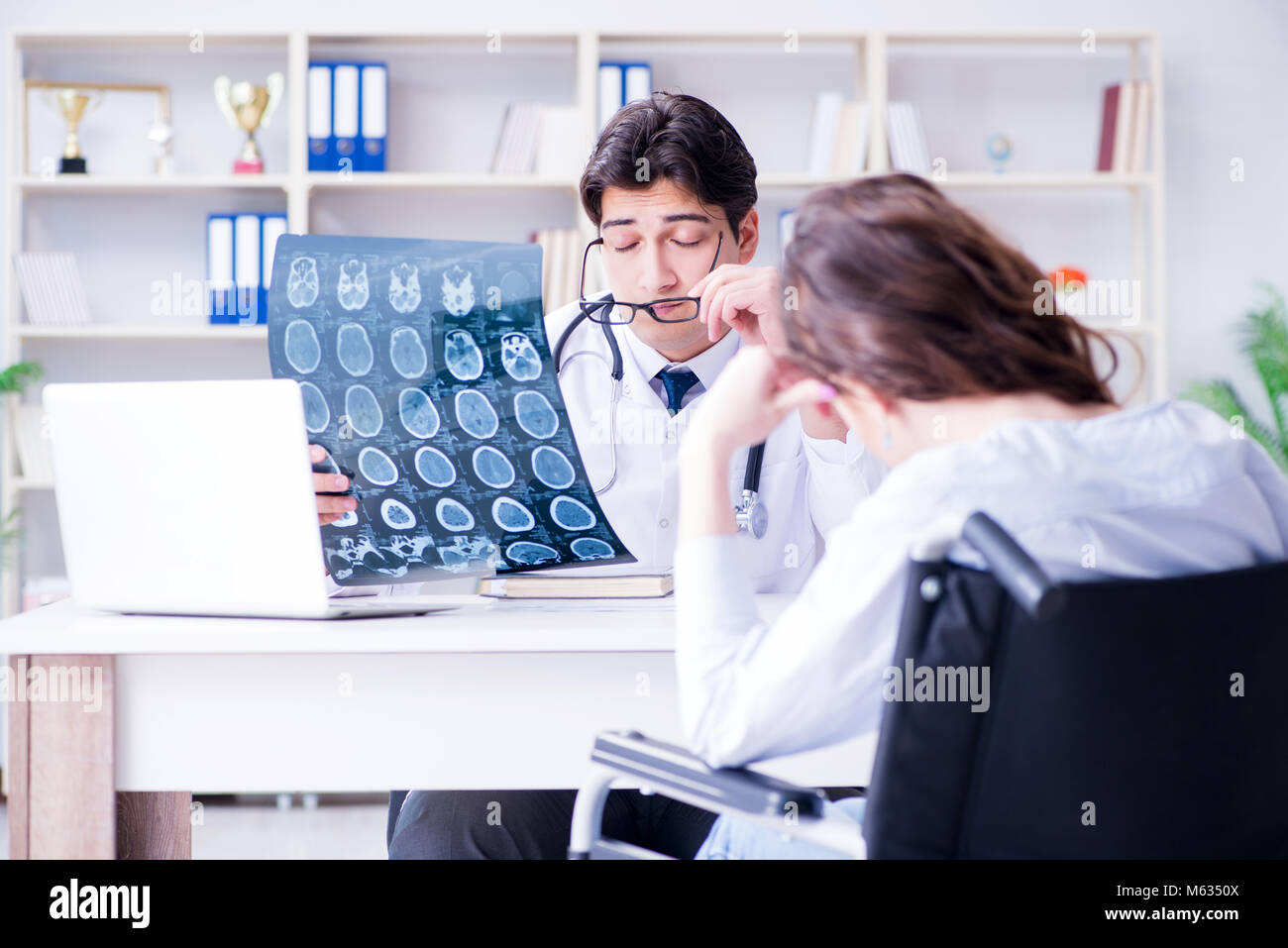 Doctor feeling pessimistic about x-ray image of patient Stock Photo - Alamy