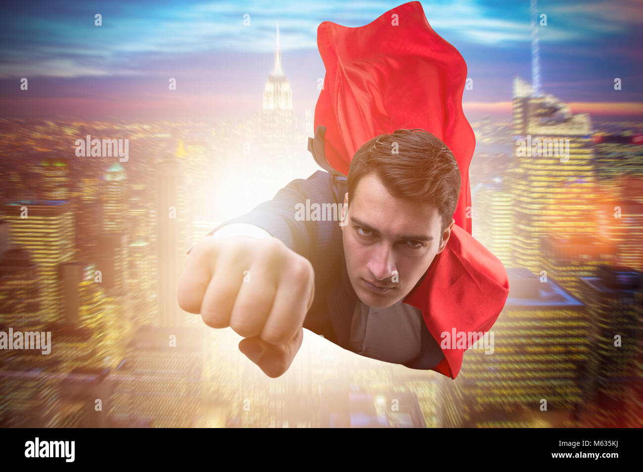 Flying super hero over the city Stock Photo - Alamy