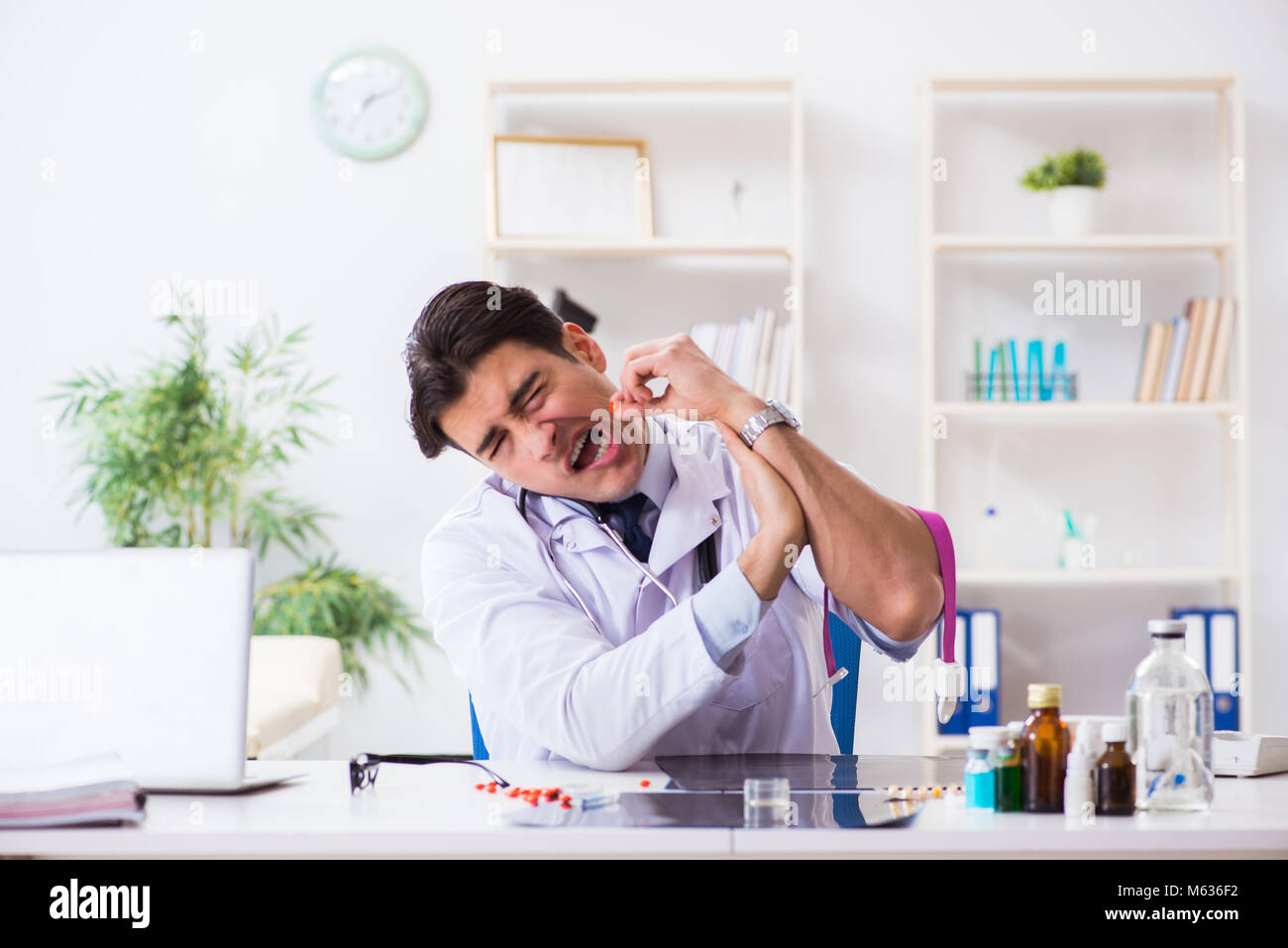 Doctor drug addict in the hospital Stock Photo - Alamy
