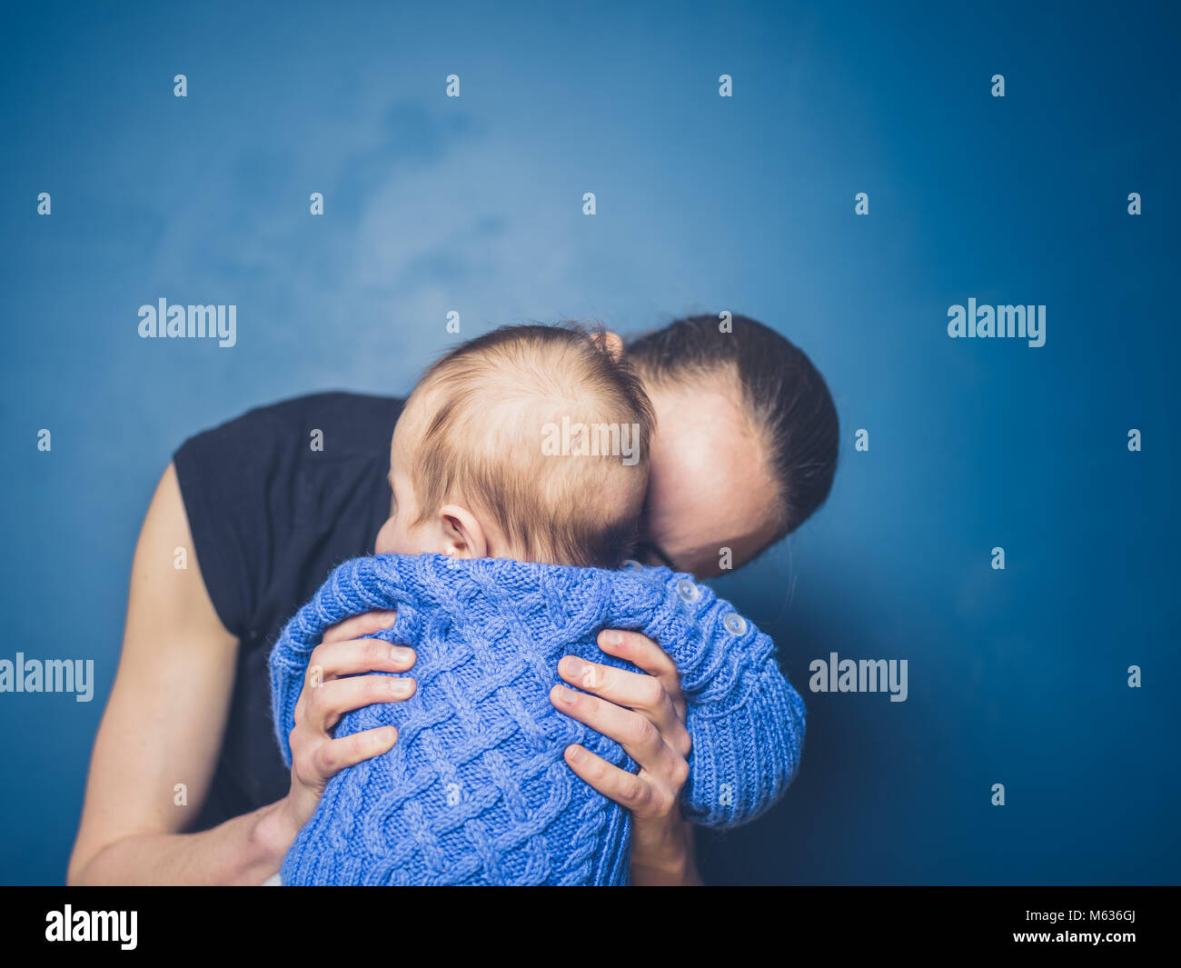 Baby in blue hi-res stock photography and images - Alamy