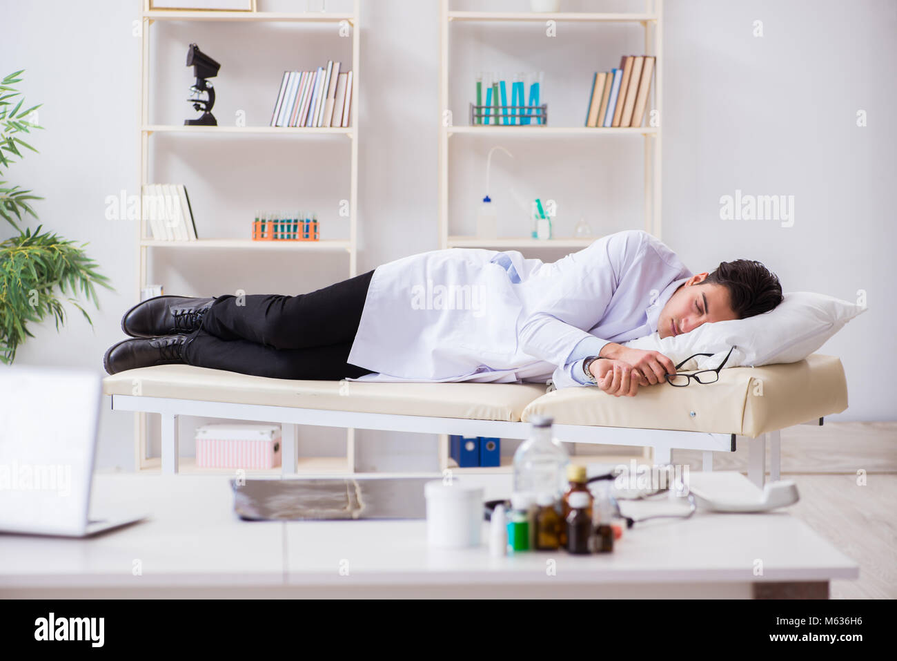 Doctor relaxing after complex surgery in hospital Stock Photo - Alamy