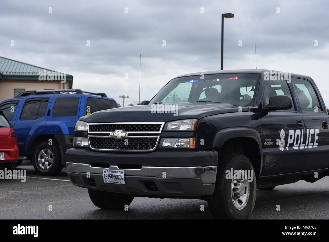 Members assigned to the 102nd Security Forces Squadron participate in ...