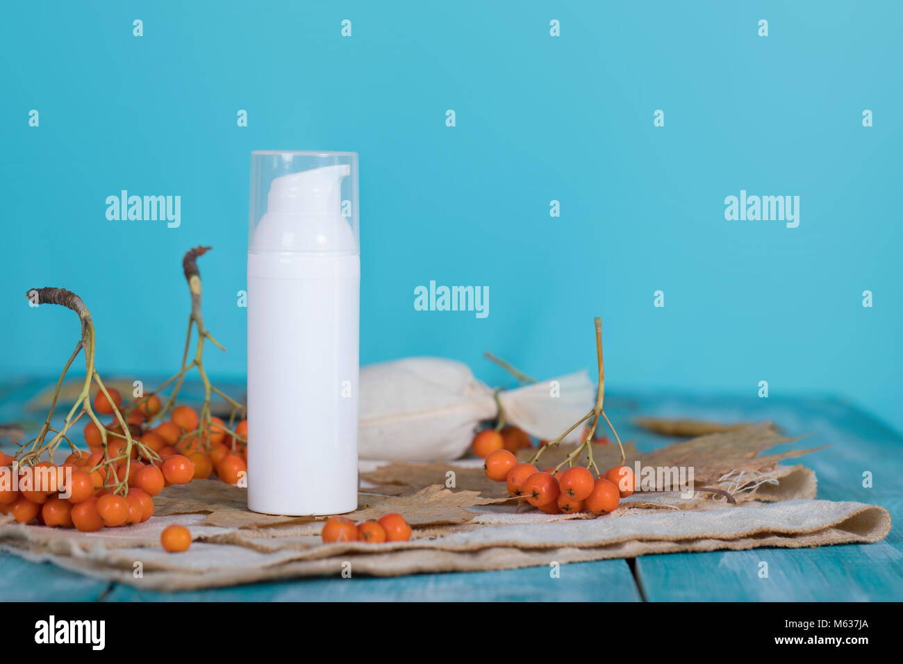 Face cream with rowan berries extract. Closeup Stock Photo - Alamy