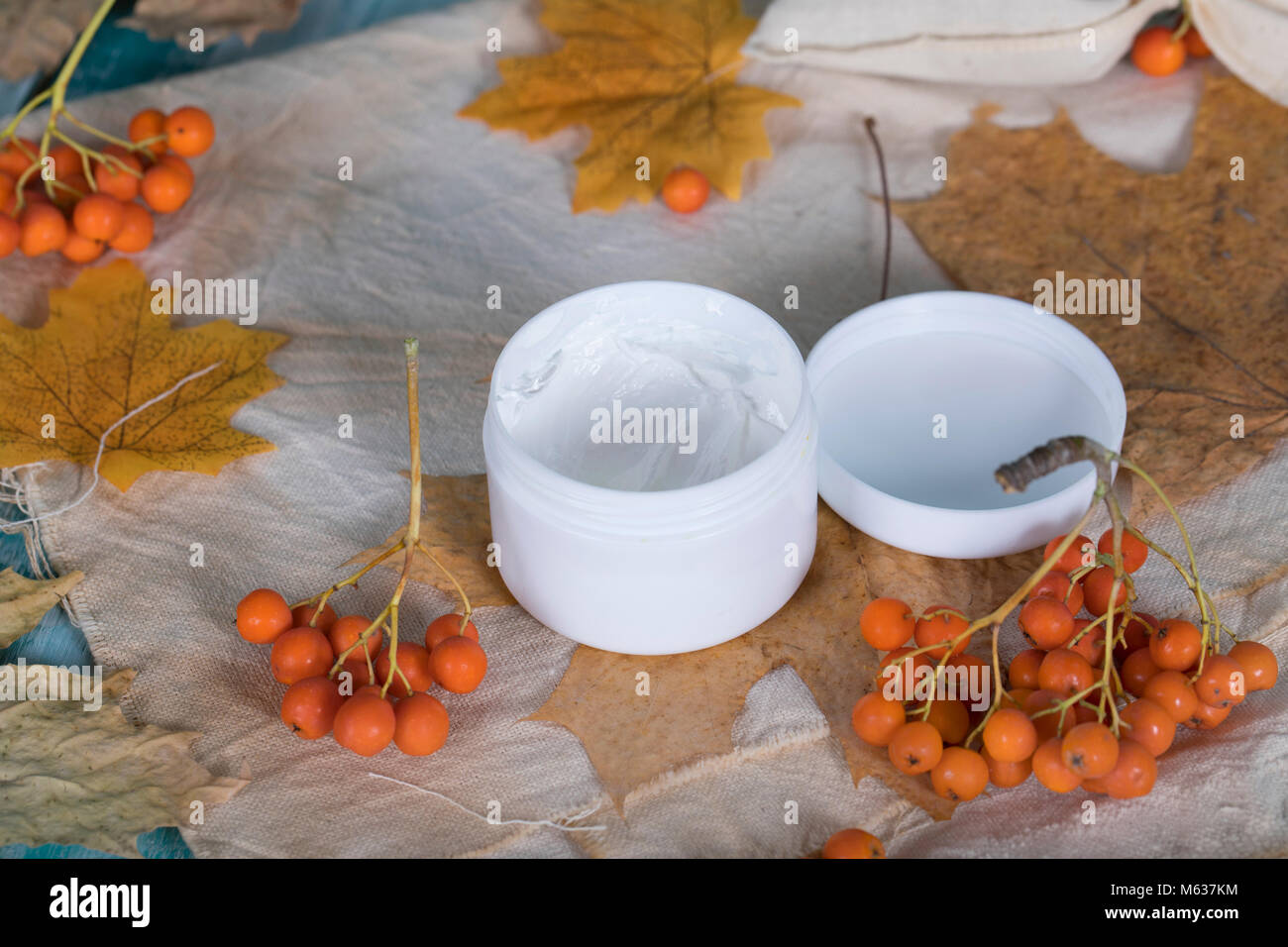 Face cream with rowan berries extract. Closeup Stock Photo - Alamy