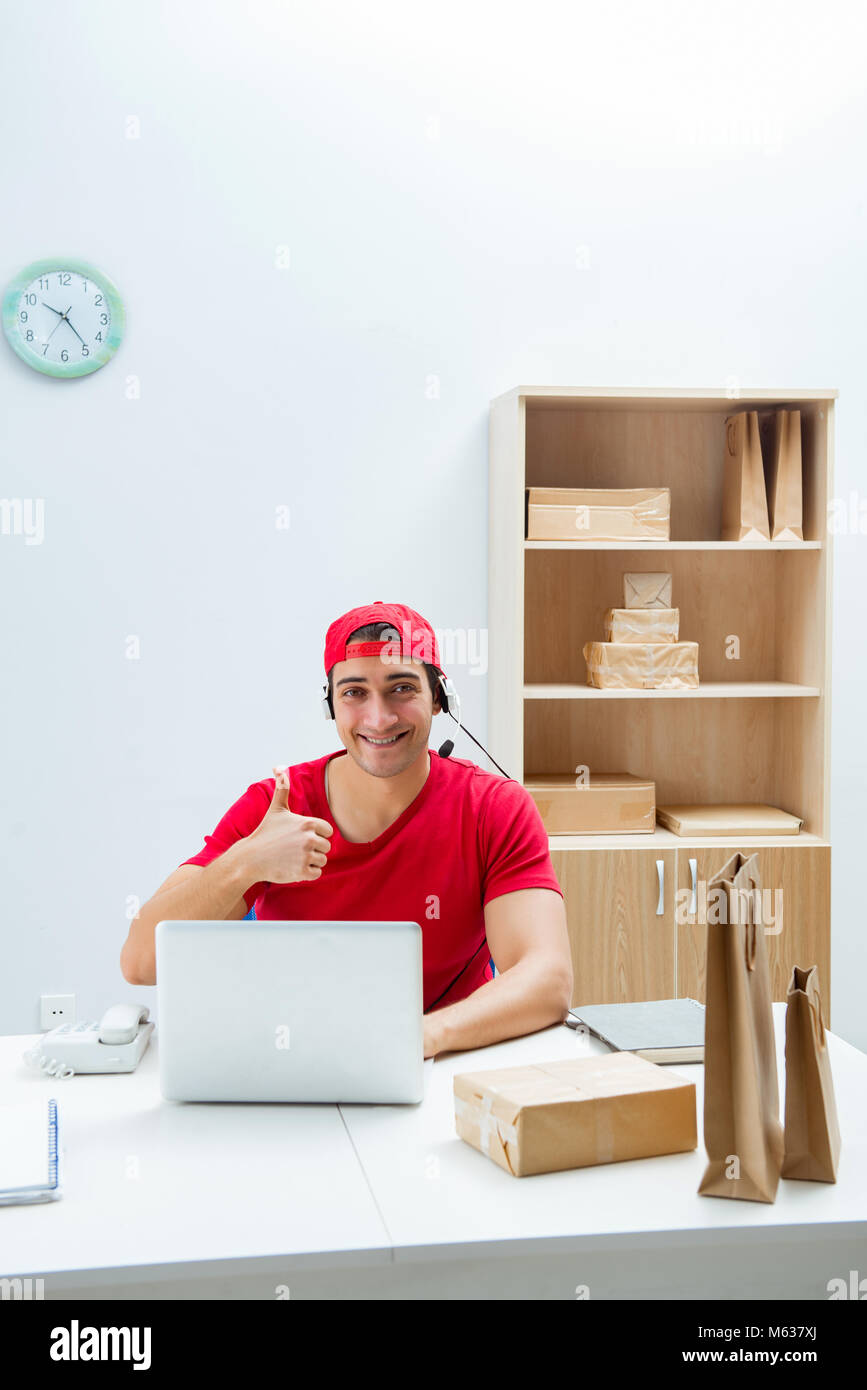 Call center worker at parcel distribution center in post office Stock ...