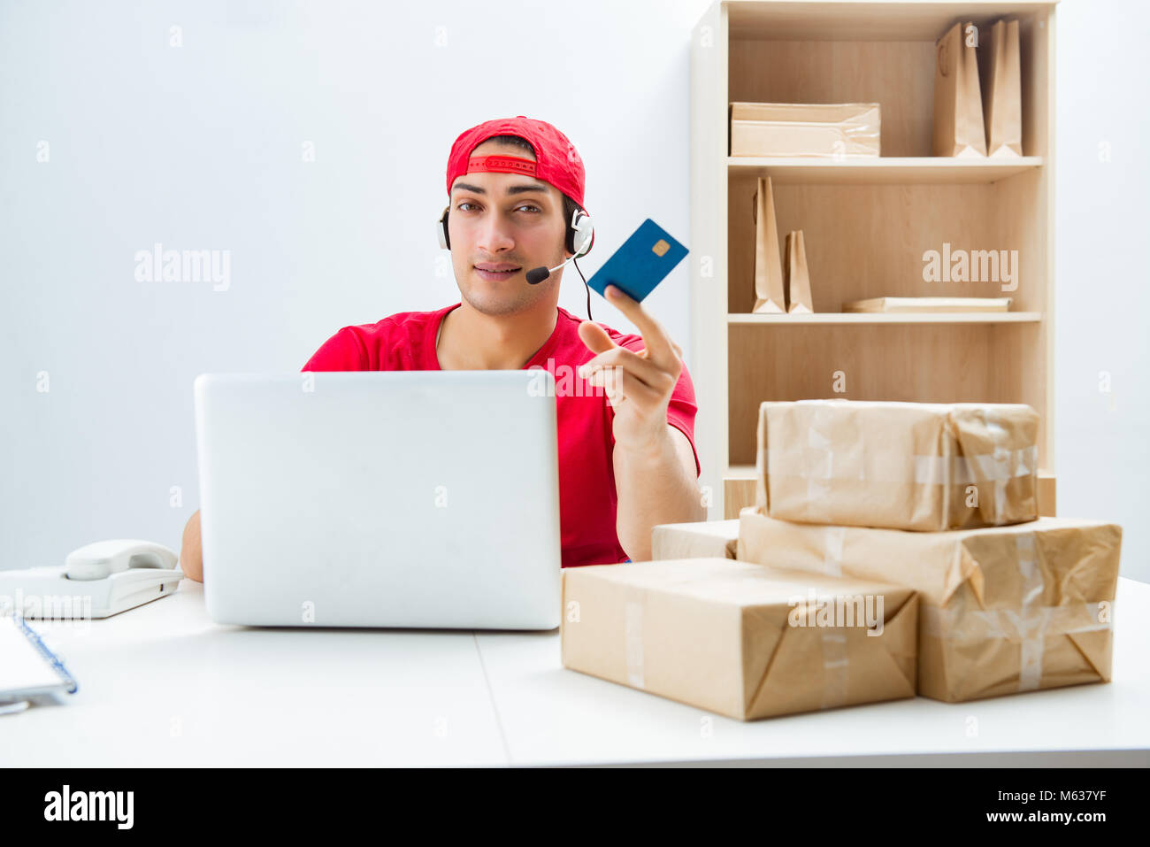 Call center worker at parcel distribution center in post office Stock ...