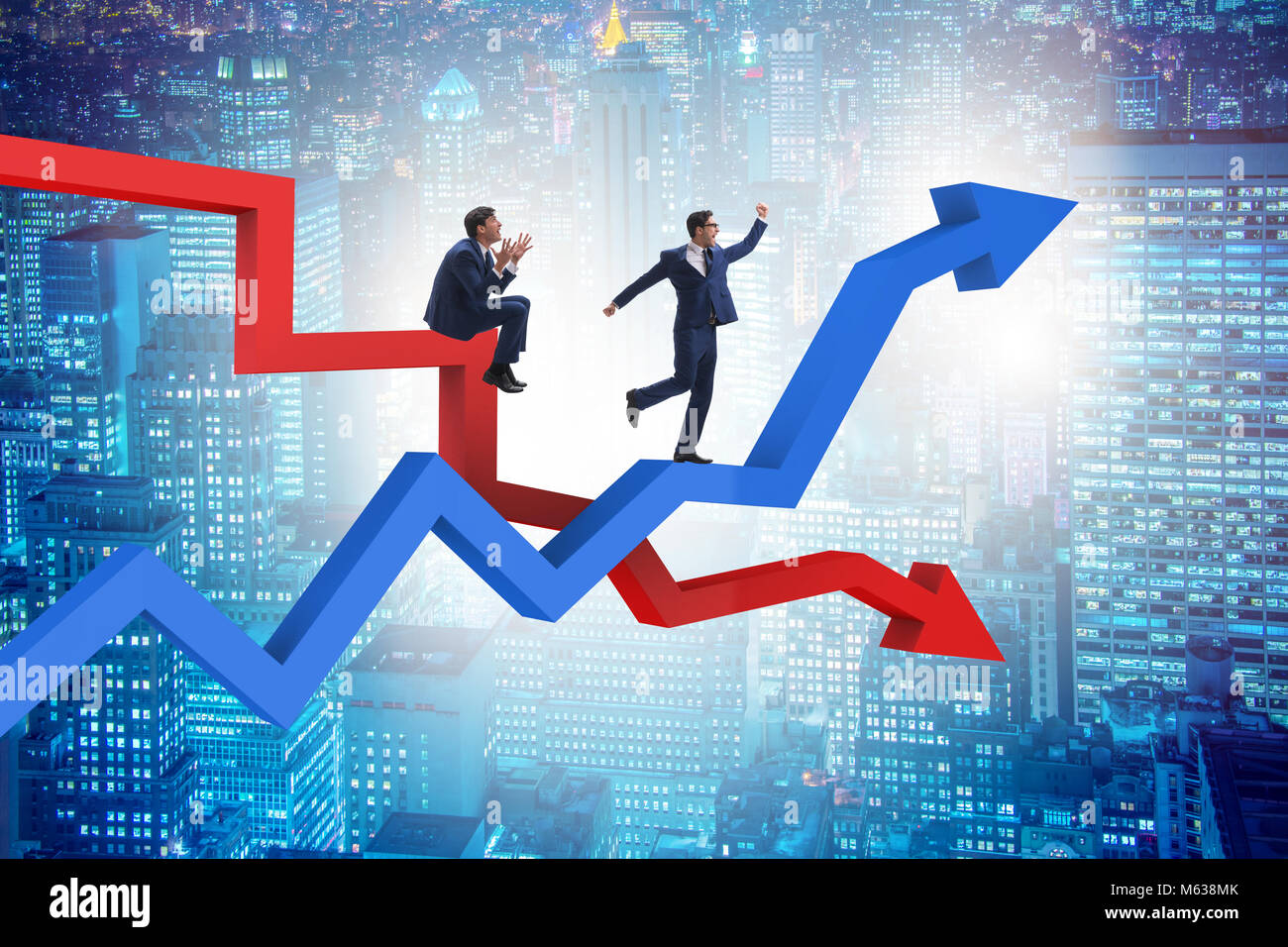 Businessman with charts of growth and decline Stock Photo - Alamy